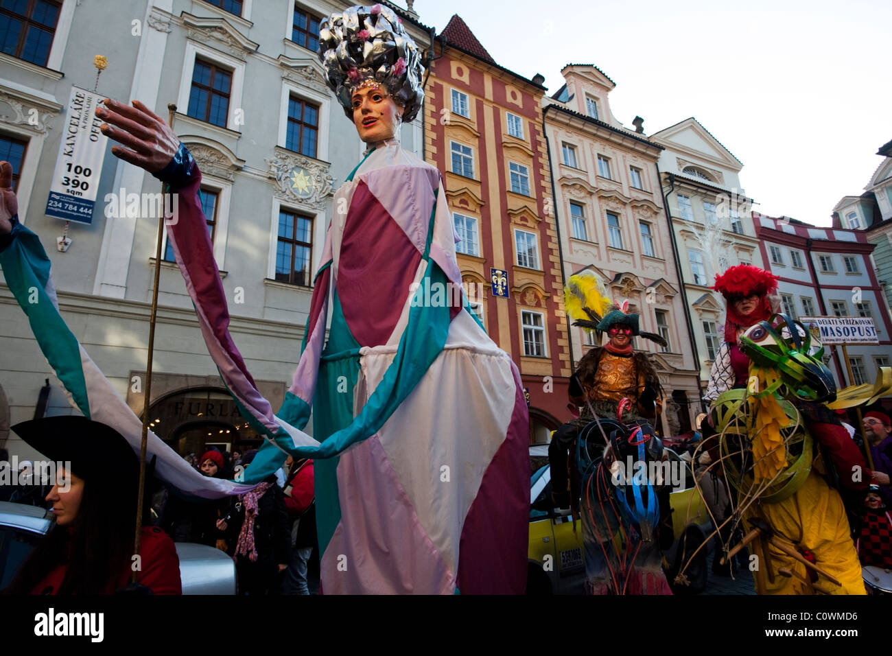Carnival procession walks through the center of Prague during the start ...