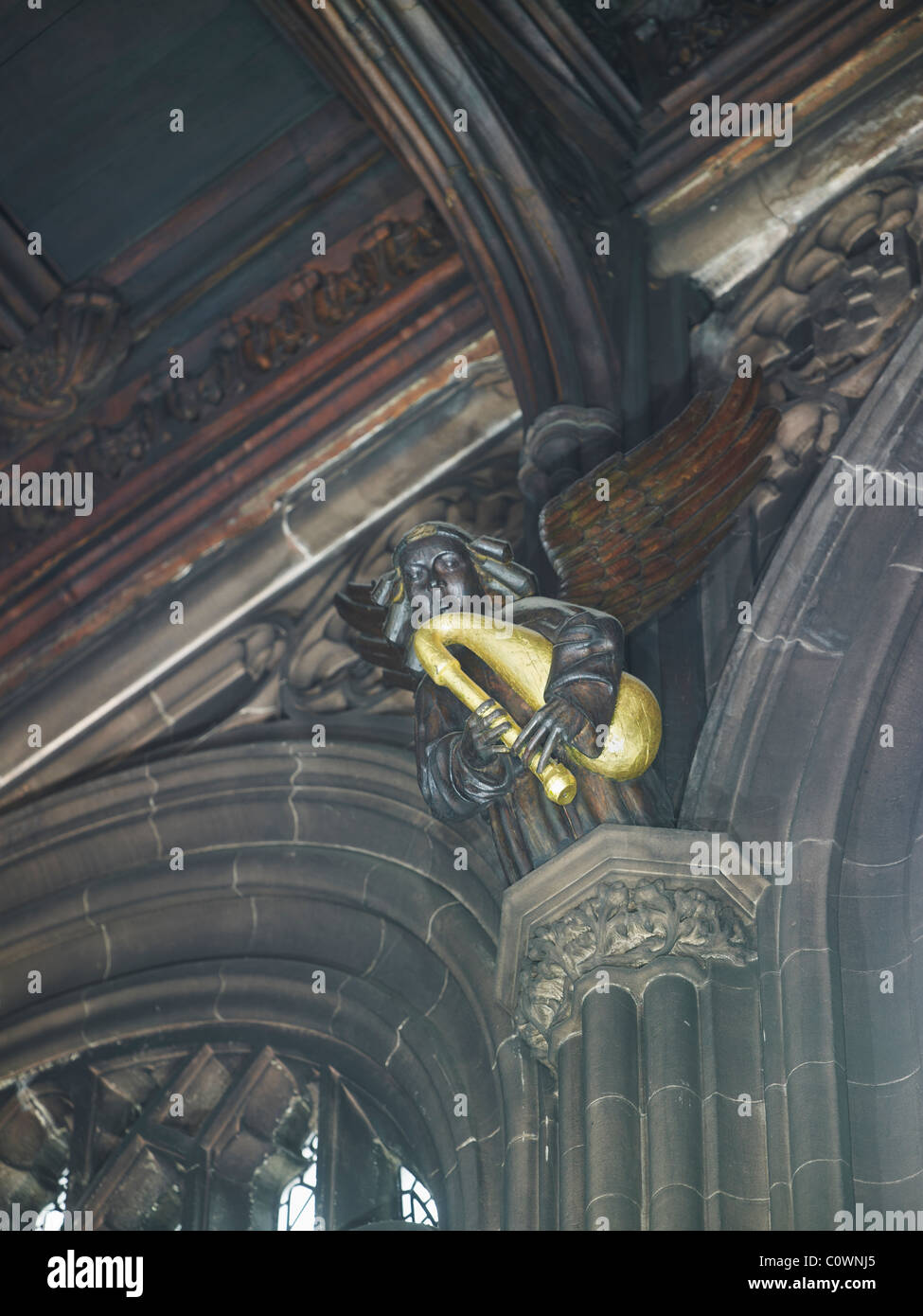Manchester Cathedral angel with bagpipes Stock Photo - Alamy