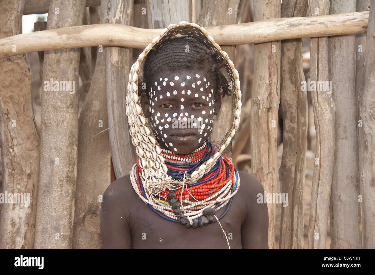 Karo girl with necklaces made of Cowry shells and facial paintings, Omo ...