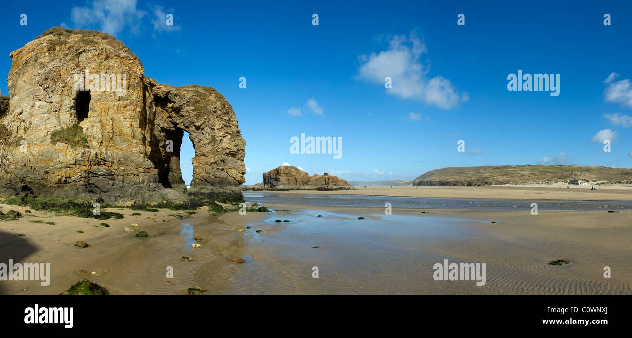 Panorama of Perranporth beach, stone arch and cave window, Cornwall UK ...