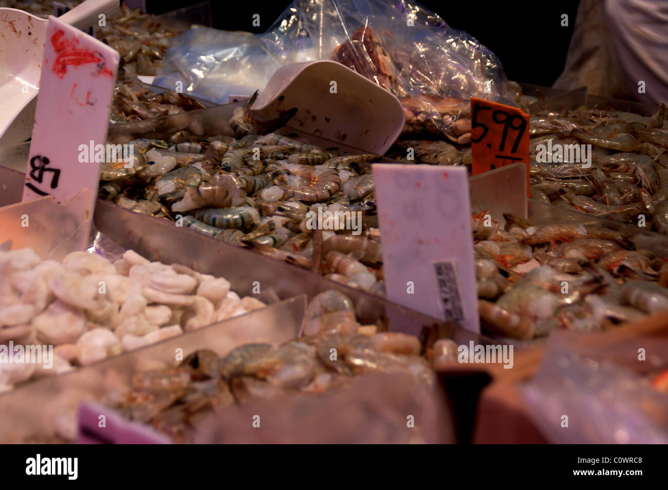 Shrimp on sale in urban fish market Stock Photo - Alamy
