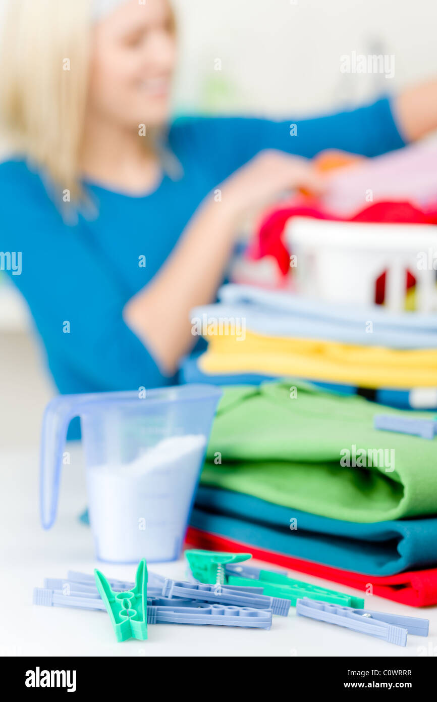 Laundry clothespin - woman in background folding clothes Stock Photo ...