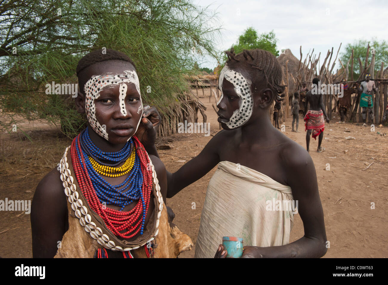 Make-Up session for a young Karo woman, Omo river valley, Southern ...