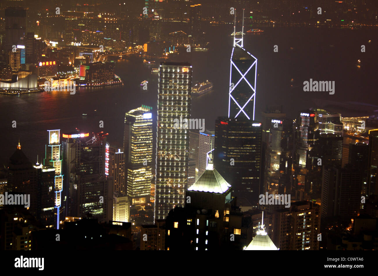 Hong Kong, China, on a cloudy night. Showing hi-rise buildings and ...