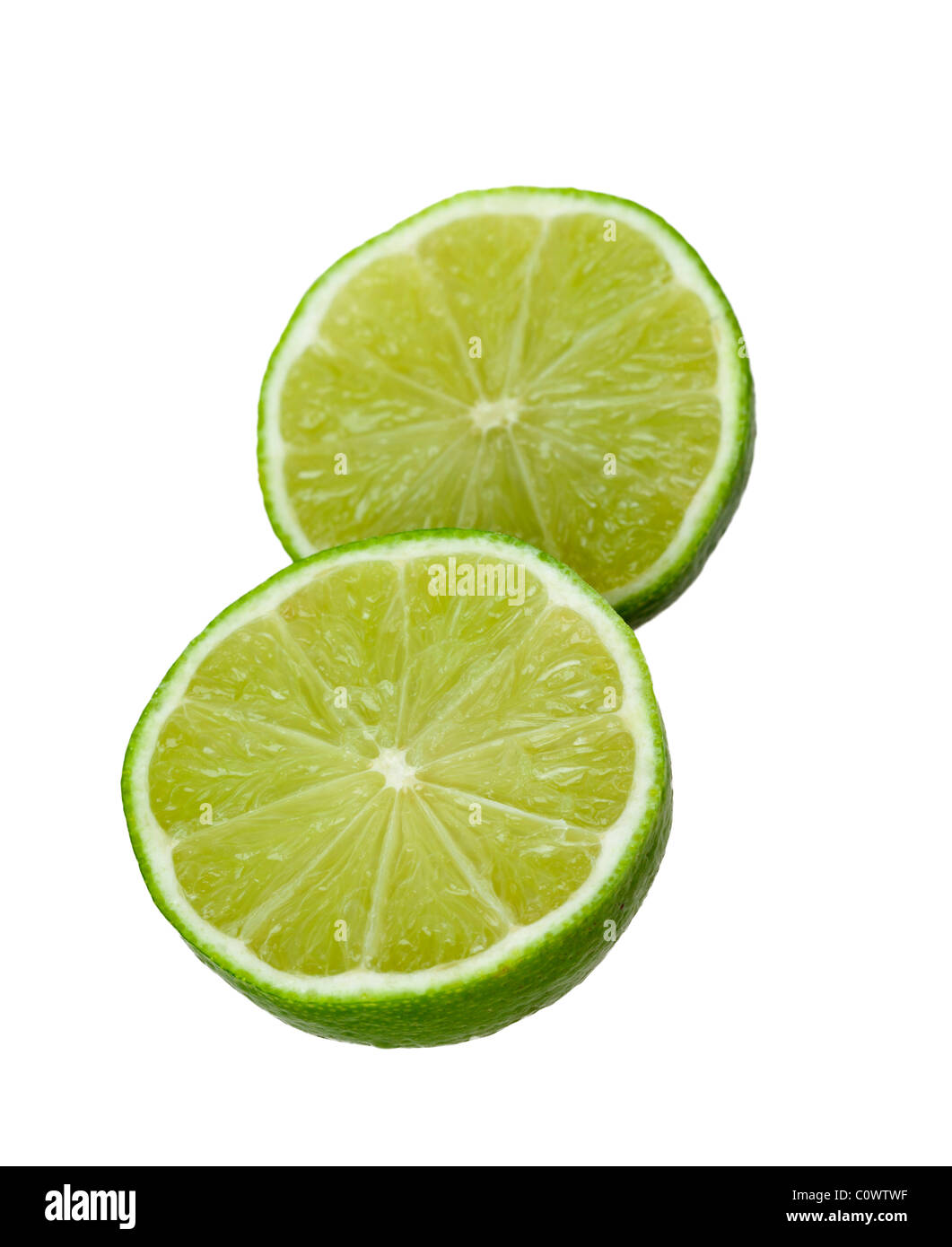 Fresh lime sliced in half isolated against a white background Stock ...