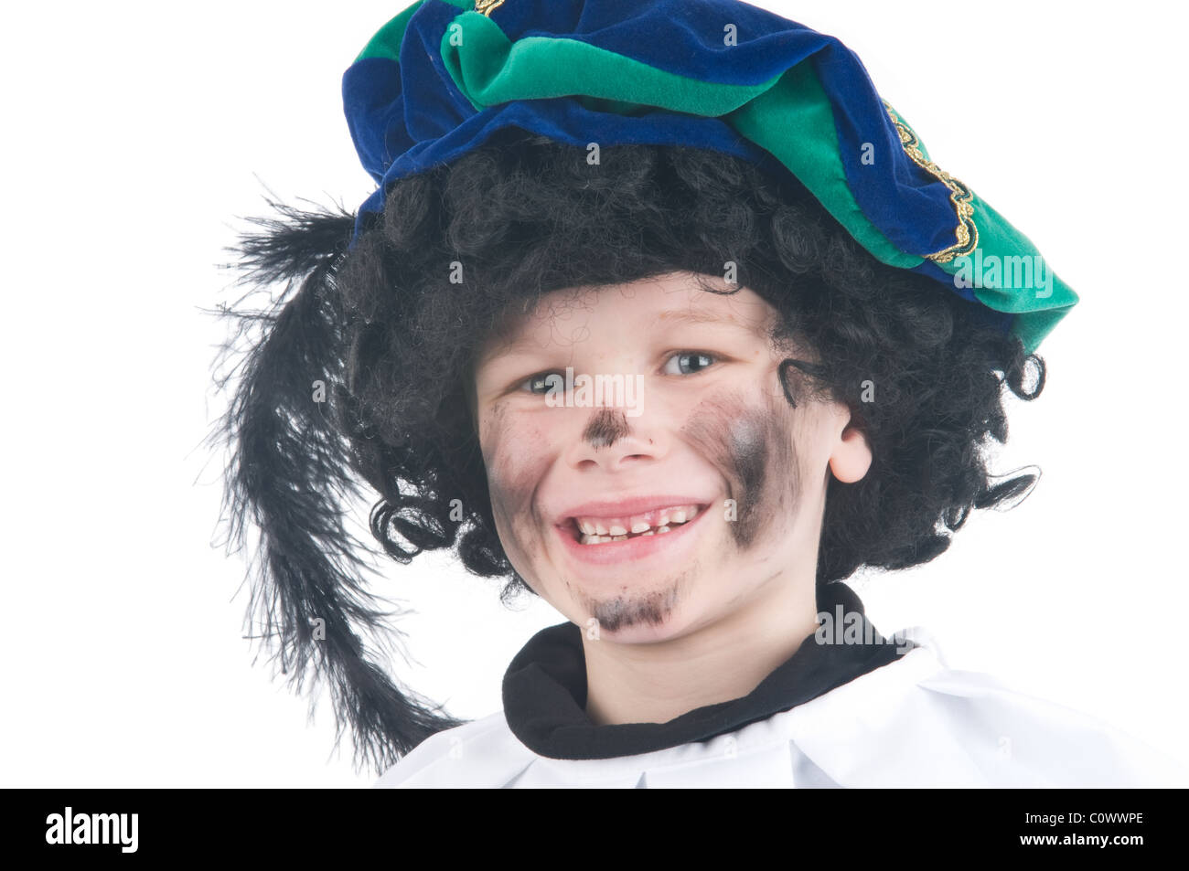 Young child playing Zwarte Piet (Black Pete), this is a Dutch tradition ...