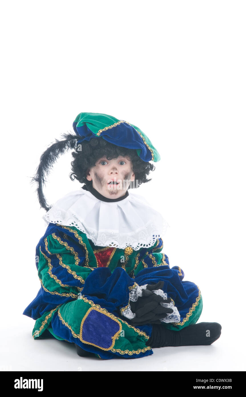 Young child playing Zwarte Piet (Black Pete), this is a Dutch tradition ...