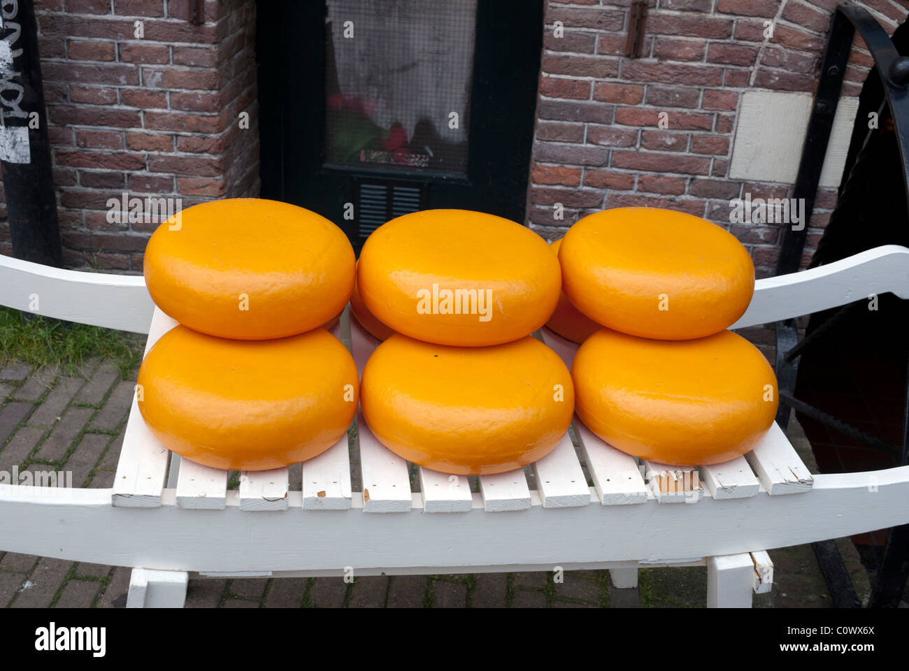 Stack of yellow Dutch cheeses Stock Photo - Alamy