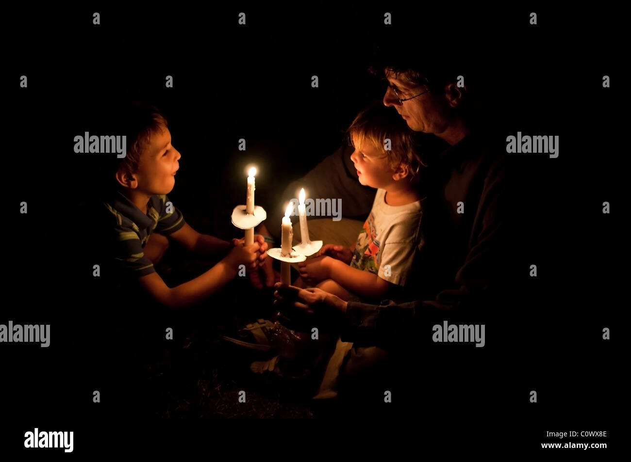 Children candlelight hi-res stock photography and images - Alamy
