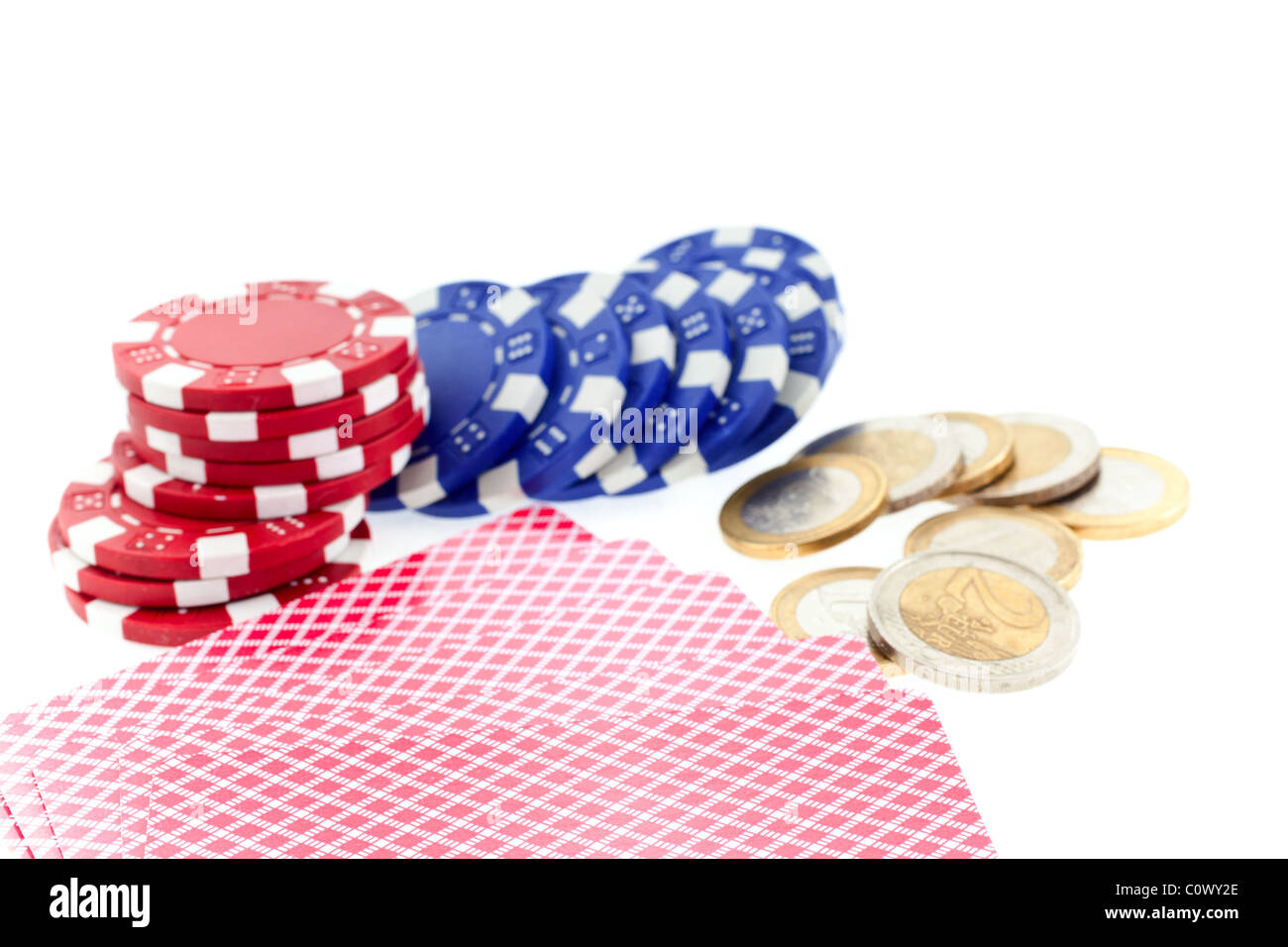 poker chips, cards and euro coins isolated on white background. another ...