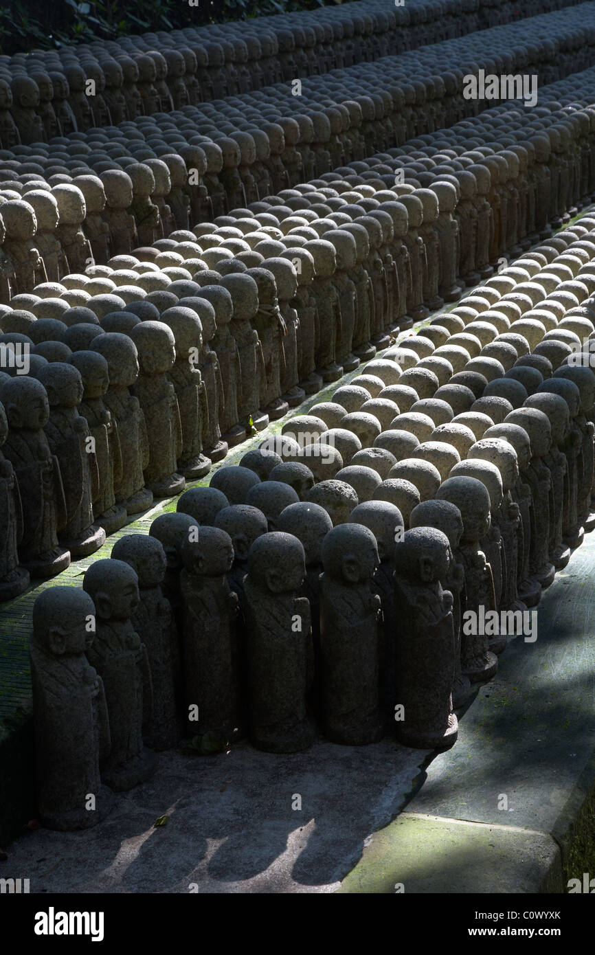 Stone monks statues Stock Photo - Alamy