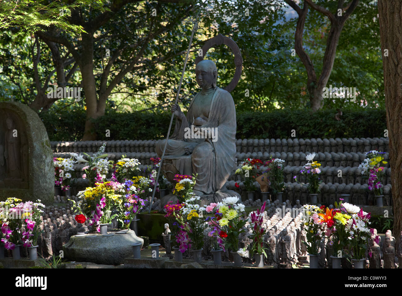 Stone monks statues Stock Photo - Alamy