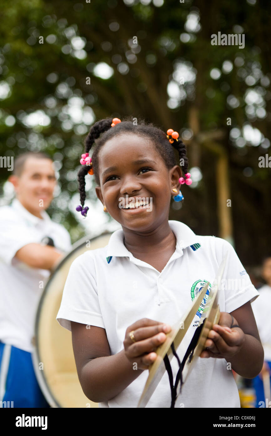 Children from Colombia playing musical instruments. The music project ...