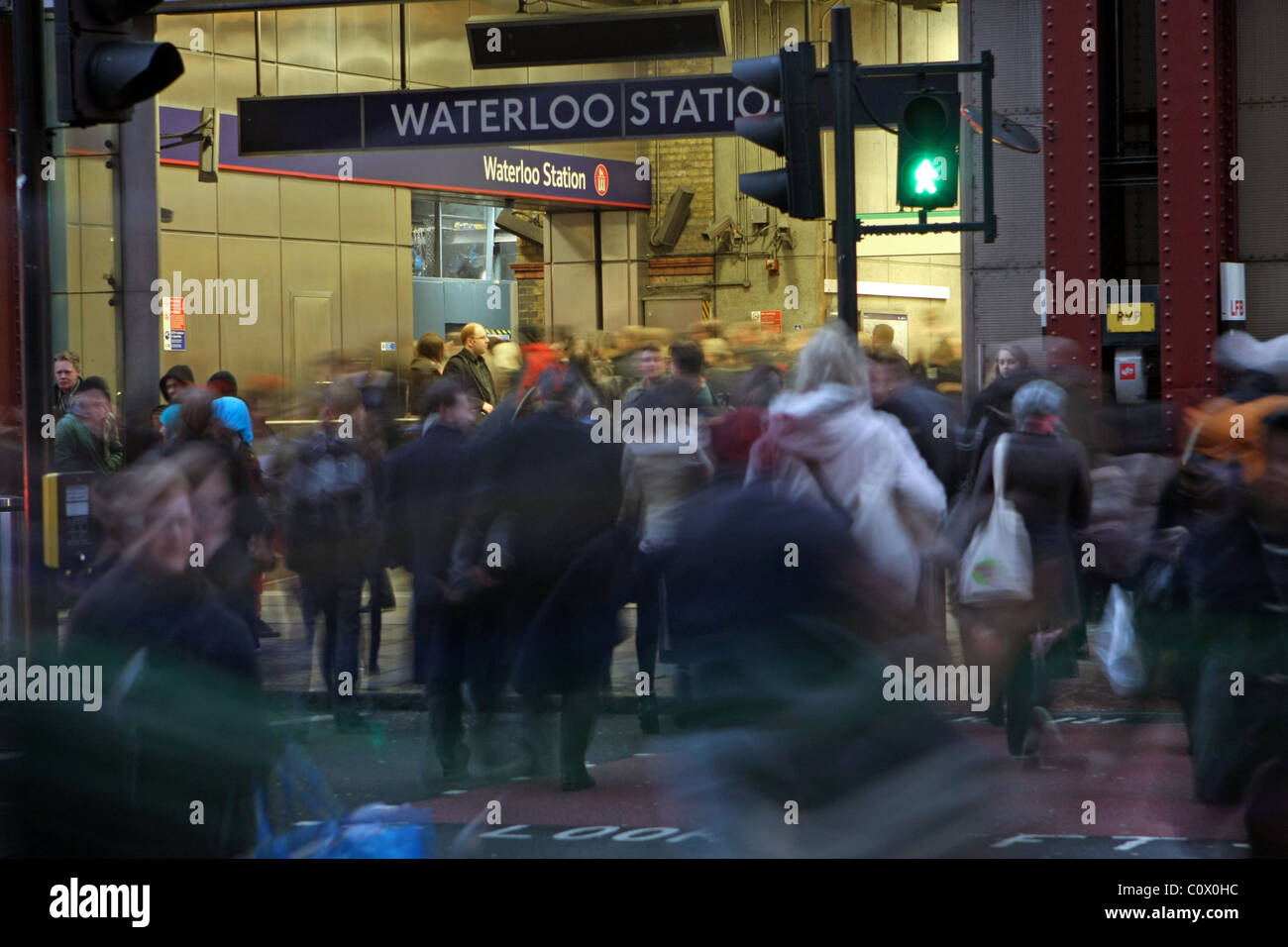 People crossing the road and walking into Waterloo train station in the ...