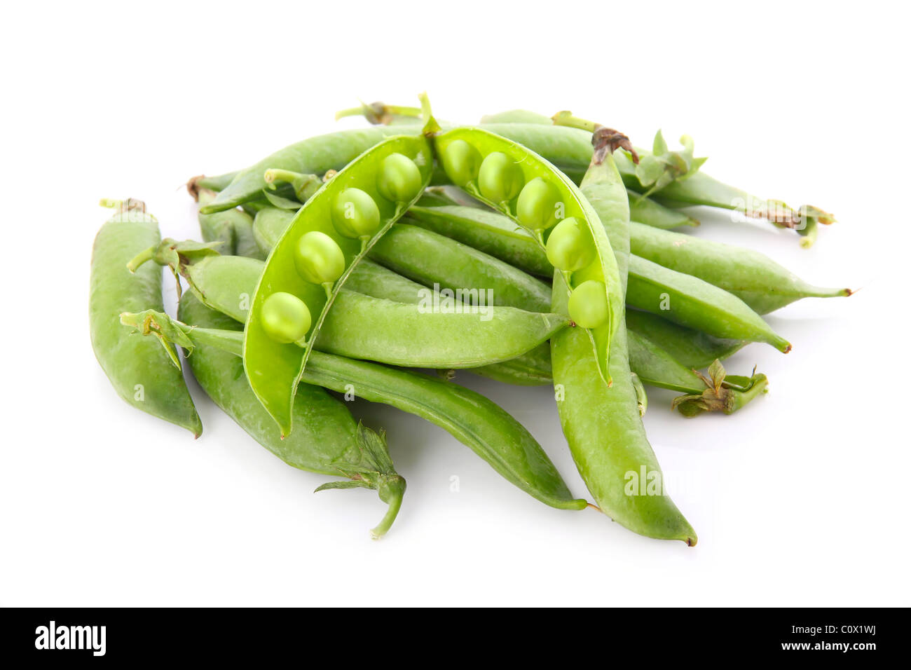Heap of ripe pea vegetable isolated Stock Photo - Alamy