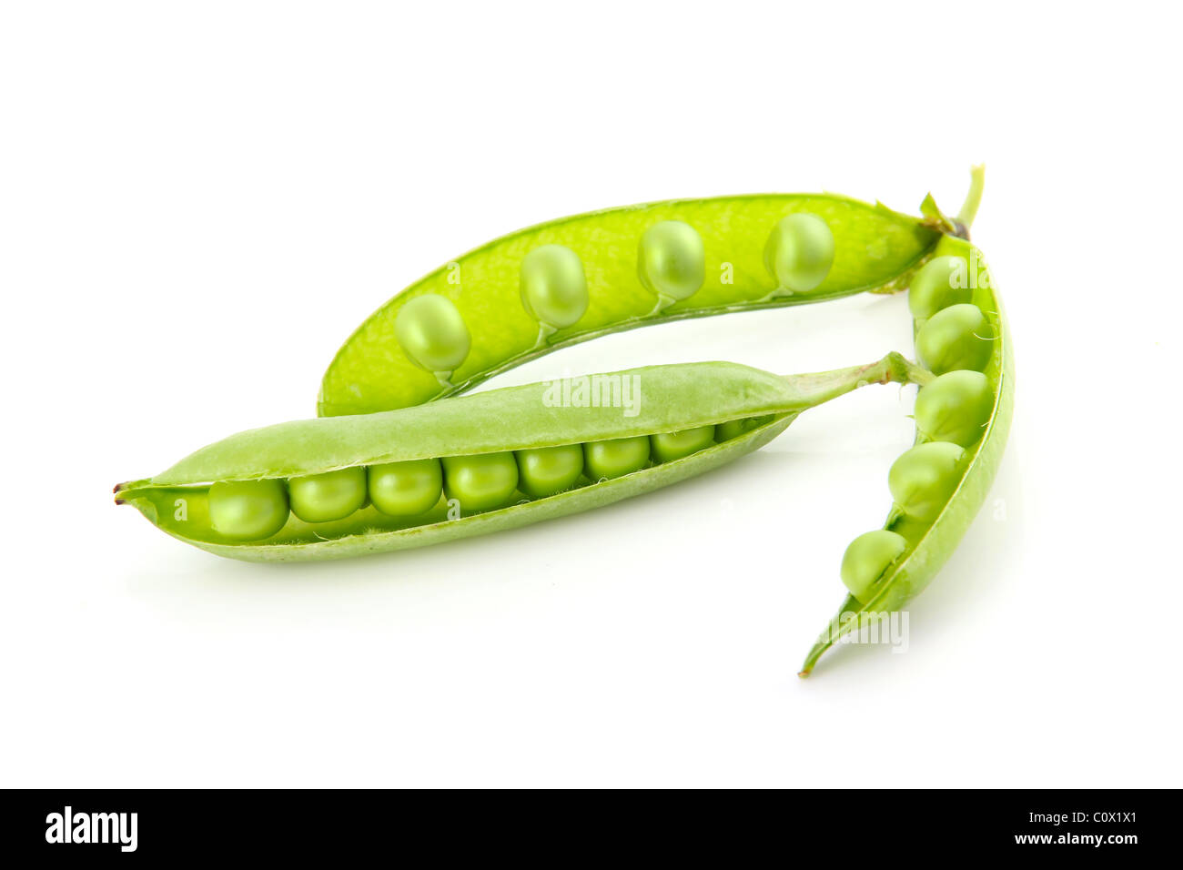 Green ripe pea vegetable isolated Stock Photo - Alamy