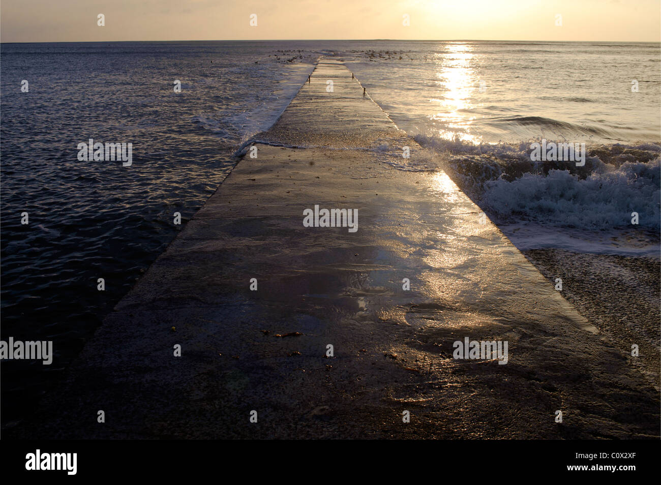 Seaside view with cement dock in Re island Stock Photo - Alamy