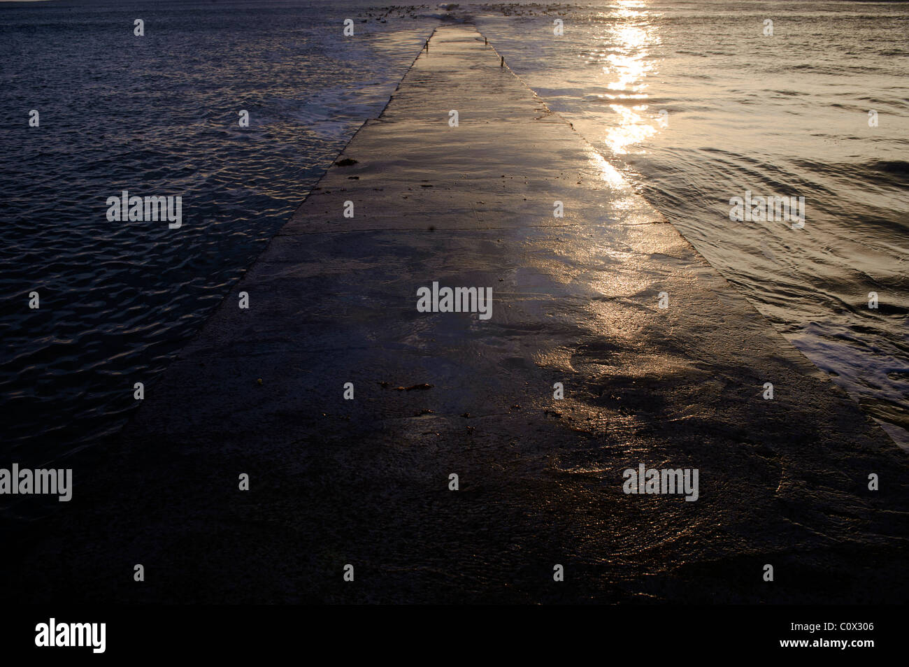 Seaside view with cement dock in Re island Stock Photo - Alamy