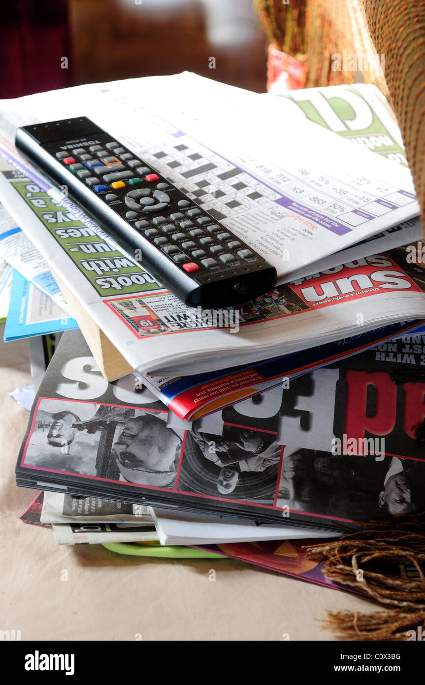Tv remote and magazine hi-res stock photography and images - Alamy
