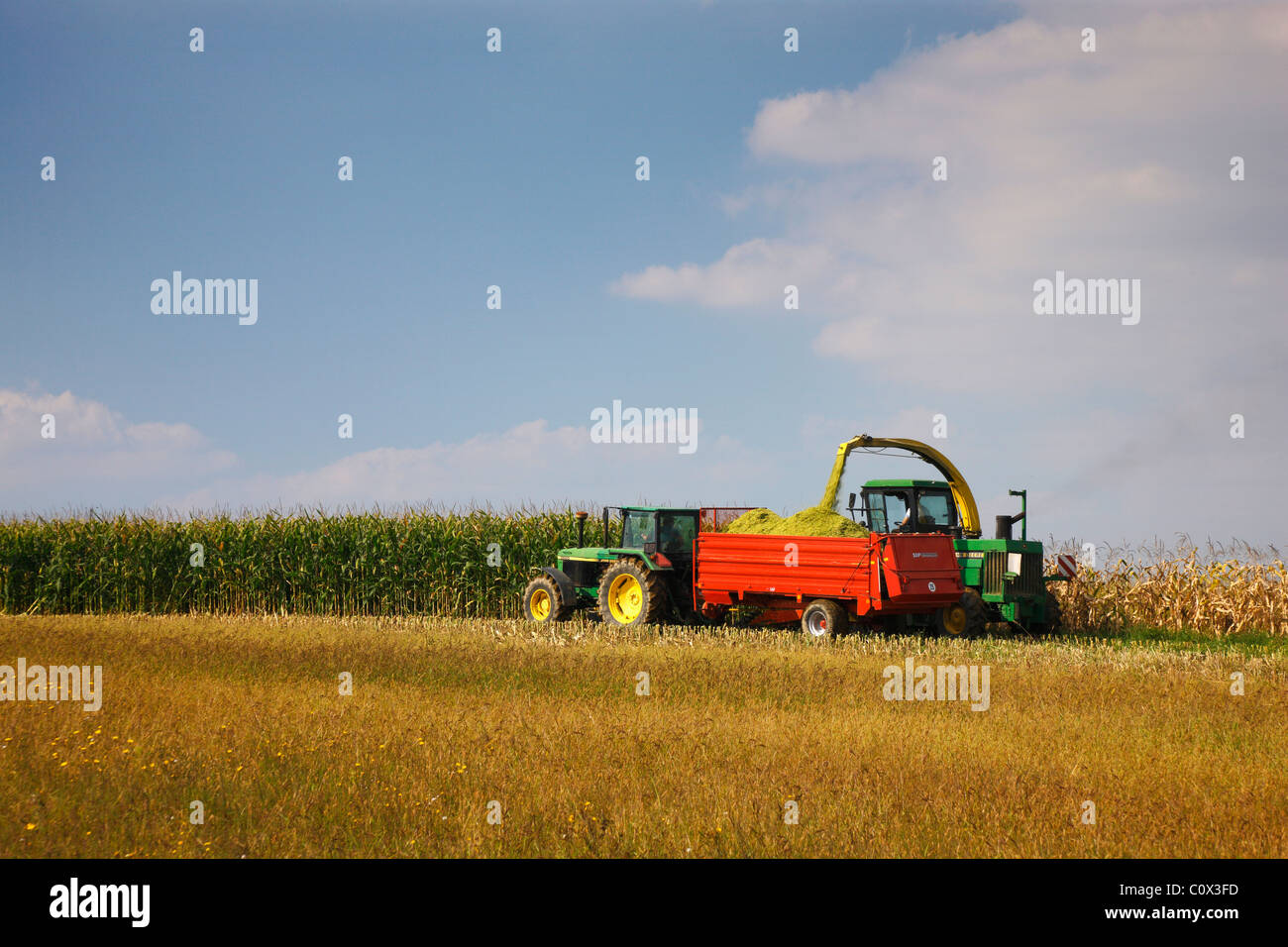 Field tractor harvesting hi-res stock photography and images - Alamy