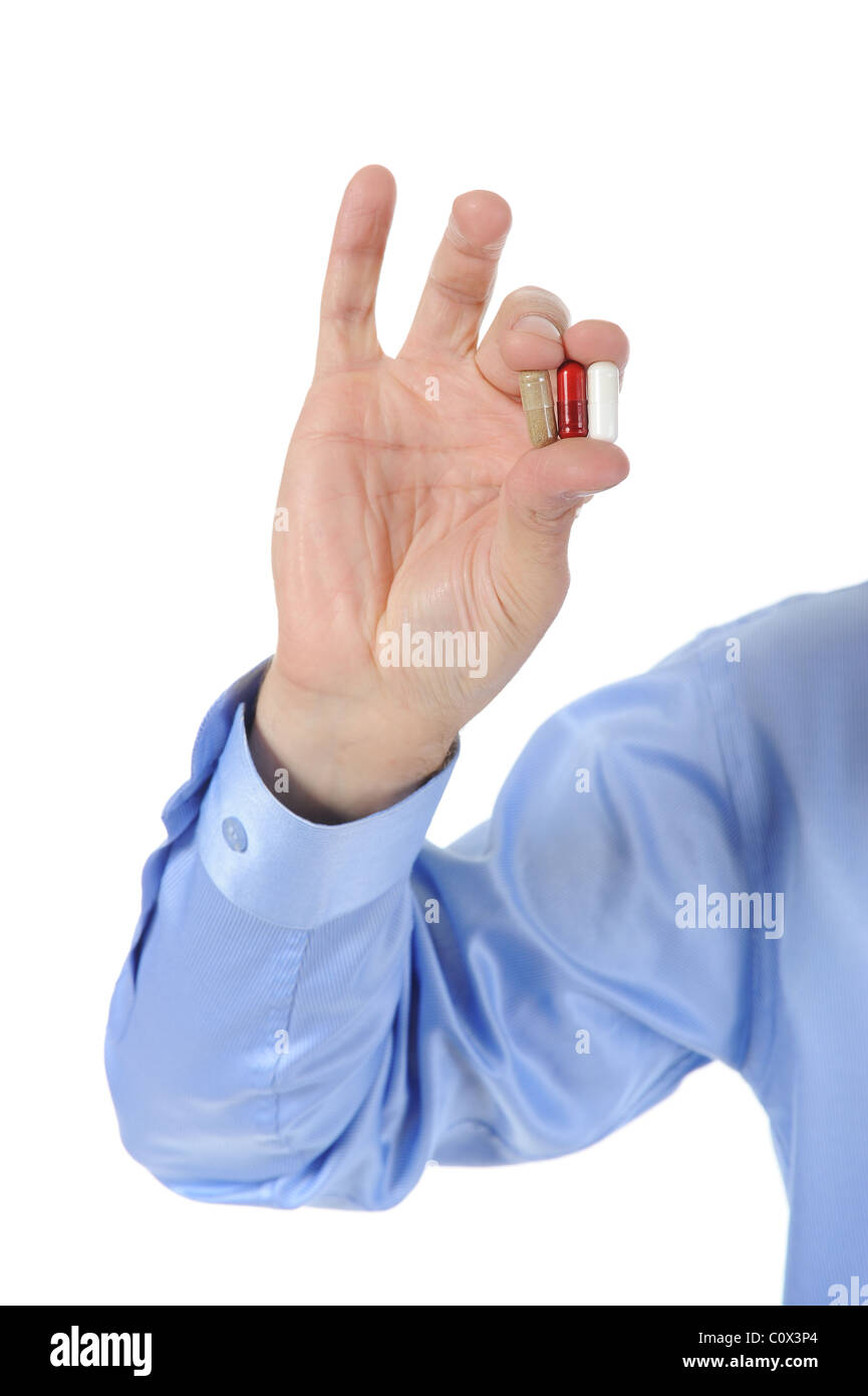 Three colored capsules Stock Photo - Alamy