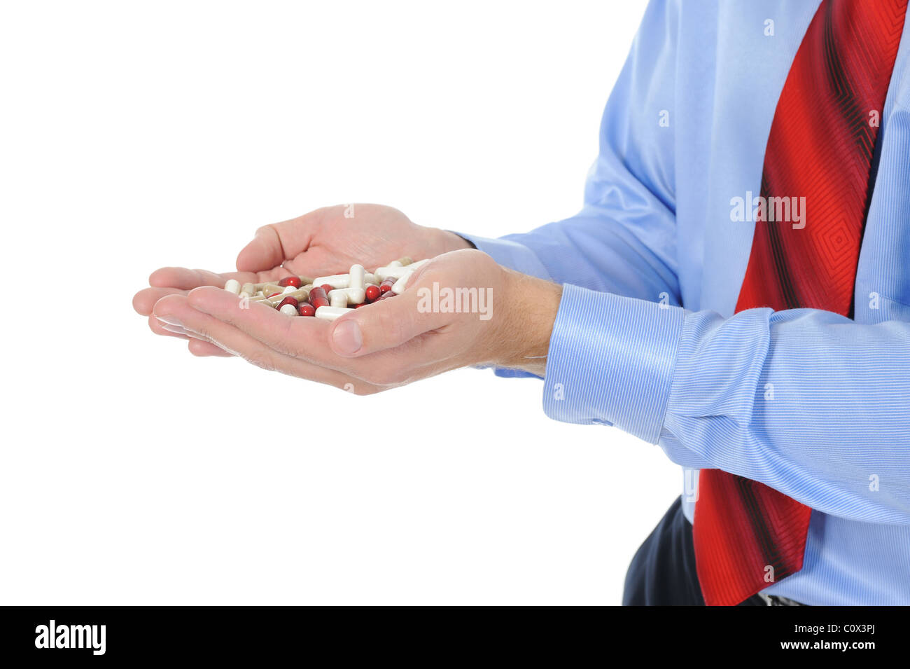 Handful of red tablets hi-res stock photography and images - Alamy