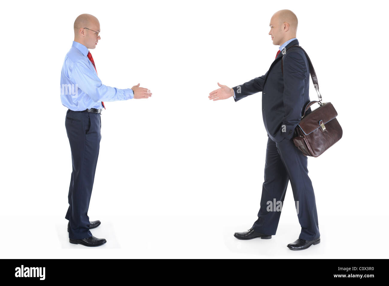 Business handshake standing Cut Out Stock Images & Pictures - Alamy