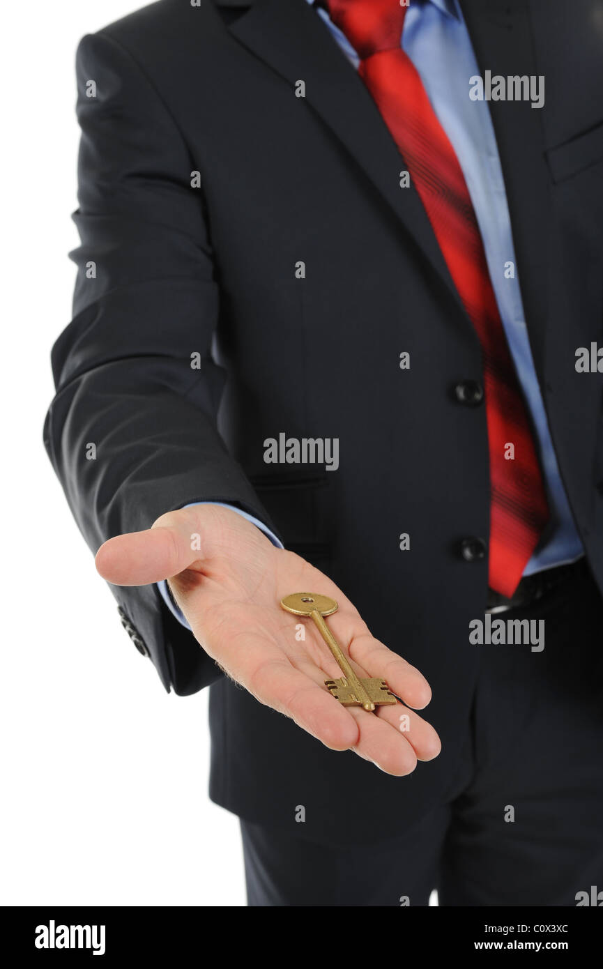 businessman gives the key Stock Photo - Alamy