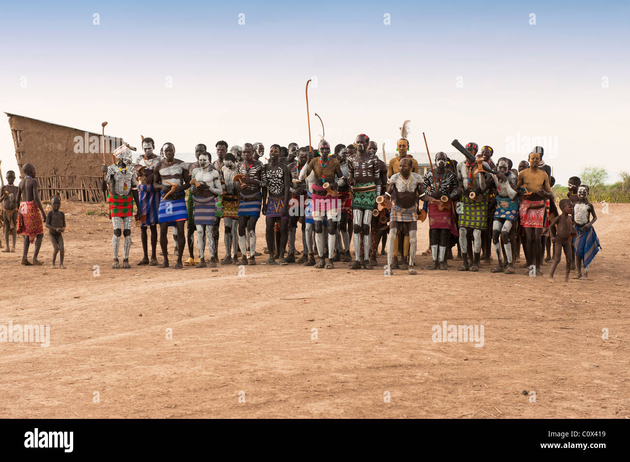 Karo people with body paintings participating in a tribal dance ...