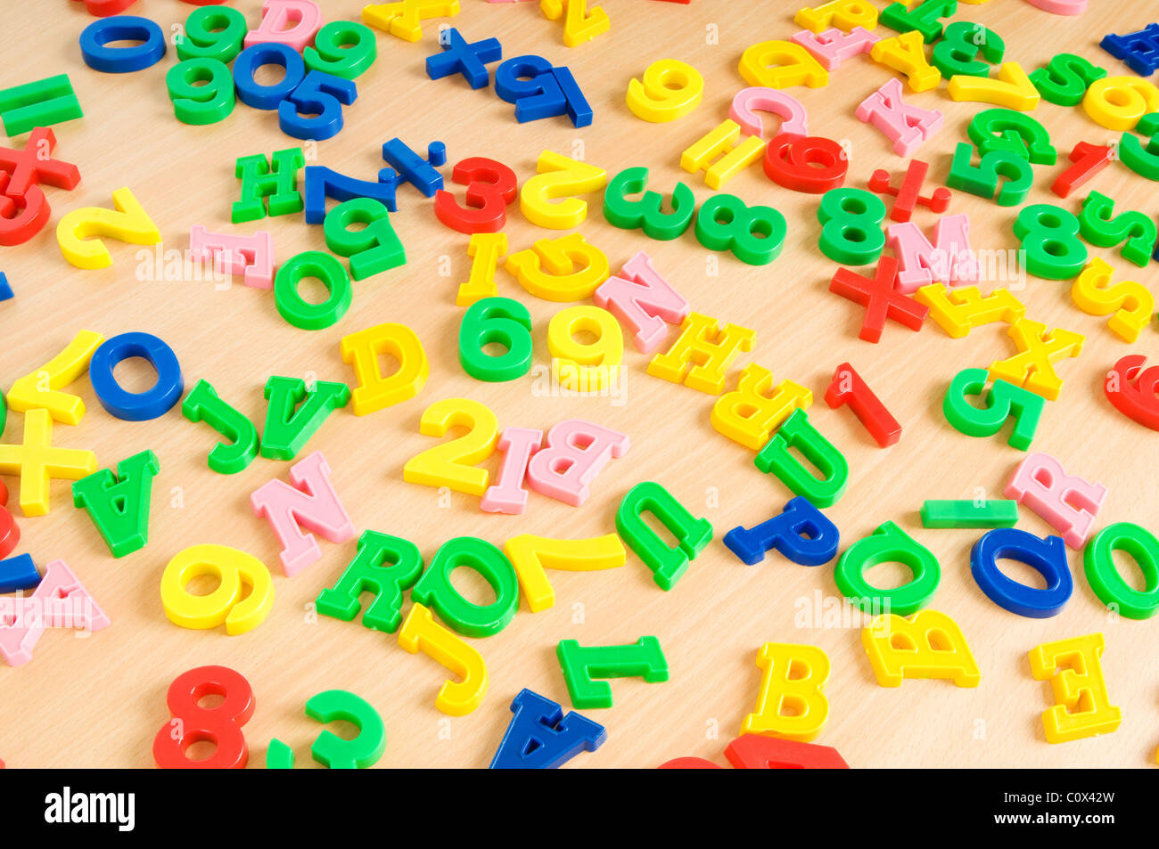 Children letters digits on table hi-res stock photography and images ...