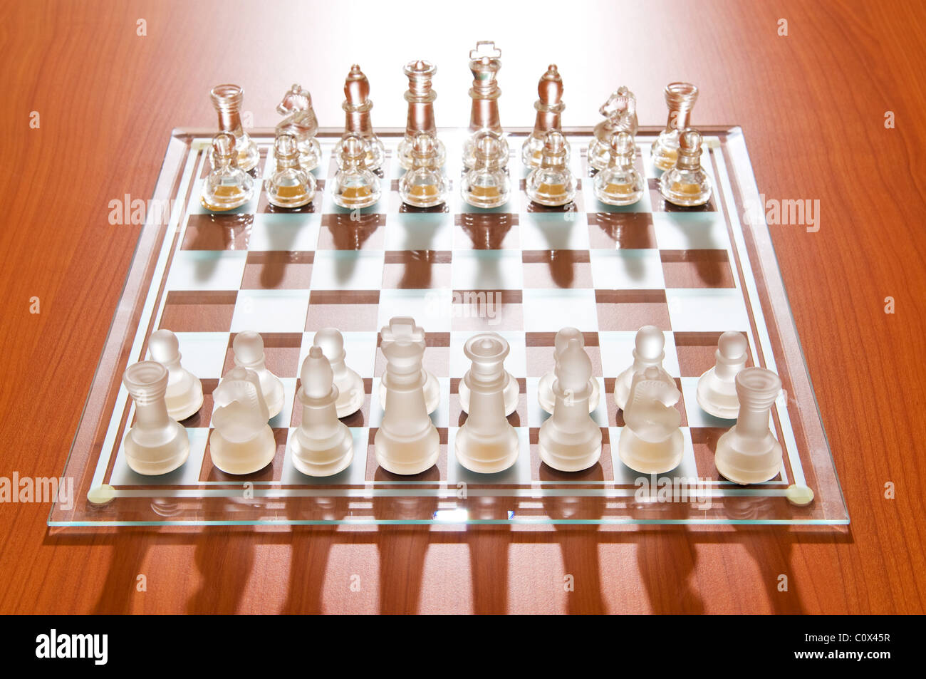 Set of chess figures on the playing board Stock Photo - Alamy