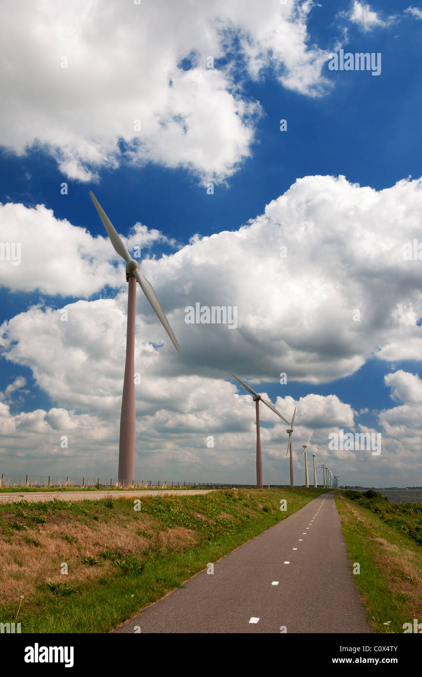 Wind turbines in Dutch agriculture landscape in summer Stock Photo - Alamy