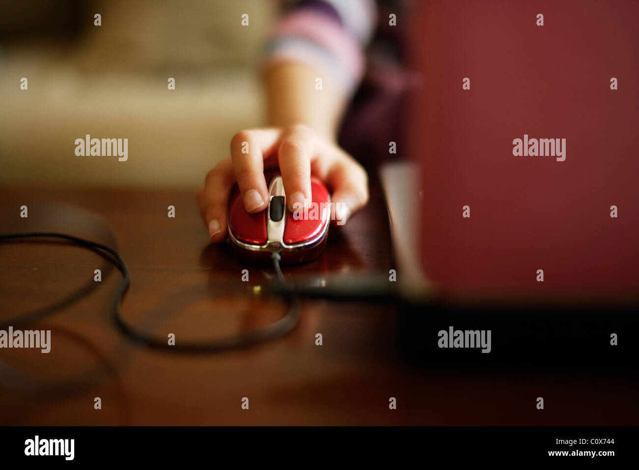 Girl using computer mouse Stock Photo - Alamy Girl using computer mouse Stock Photo - Alamy