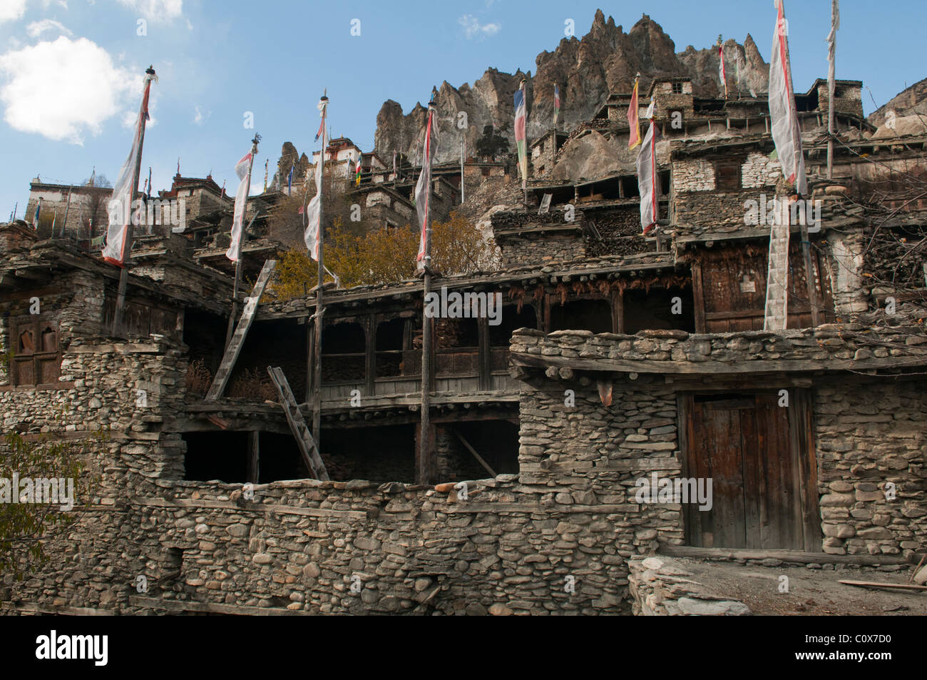 stone houses in the traditional Tibetan village of Braga in the Mustang ...