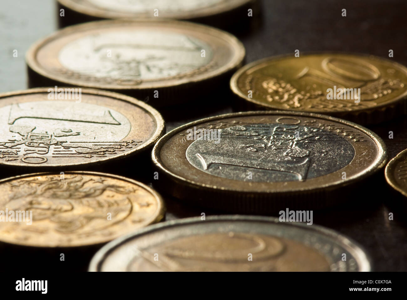 Euro coins on table in macro close up Stock Photo - Alamy
