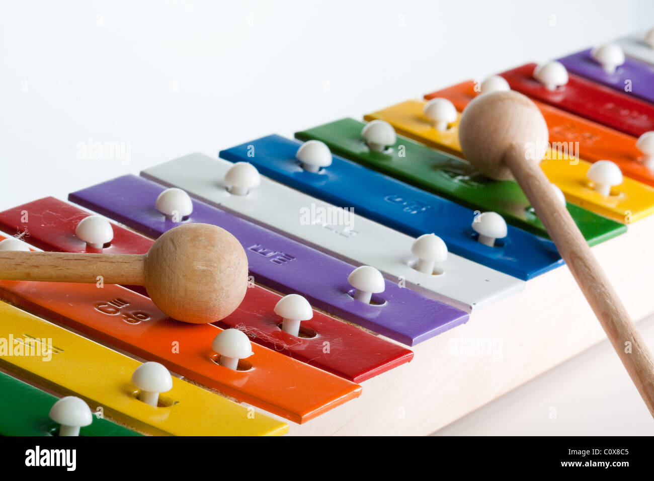 Xylophone in multi colours isolated on white Stock Photo - Alamy