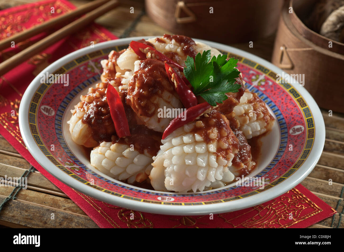 Chilli squid Chinese food Stock Photo - Alamy