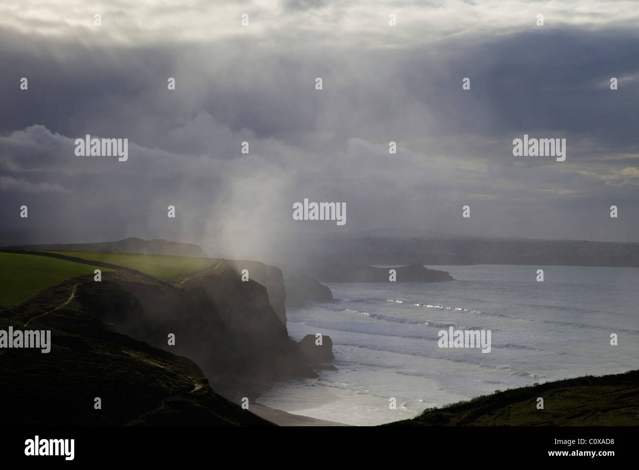 Sun and rain from winter storm, Watergate Bay, Newquay, Cornwall, South ...