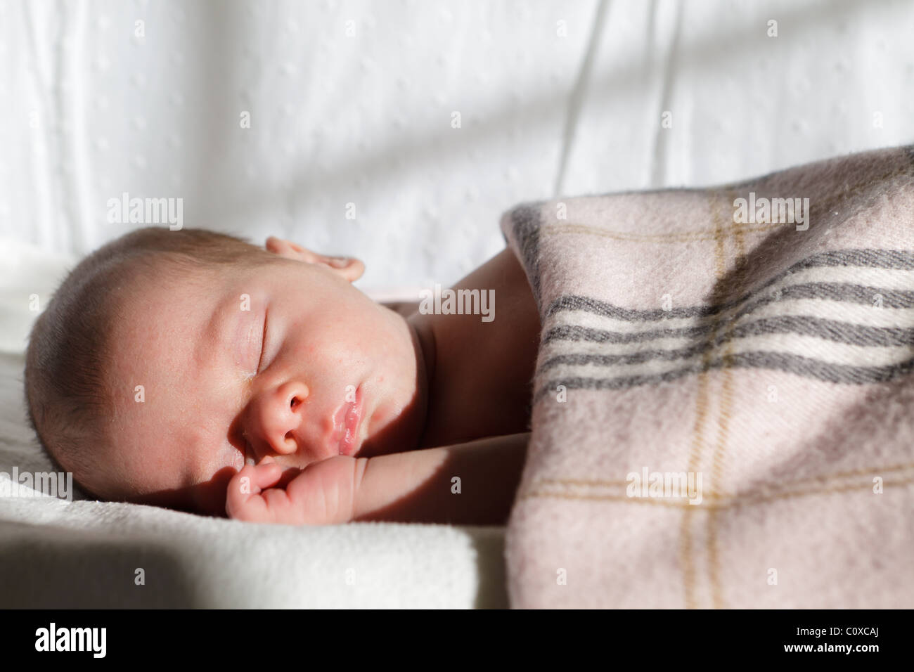 Newborn boy sleeping peacefully hi-res stock photography and images - Alamy