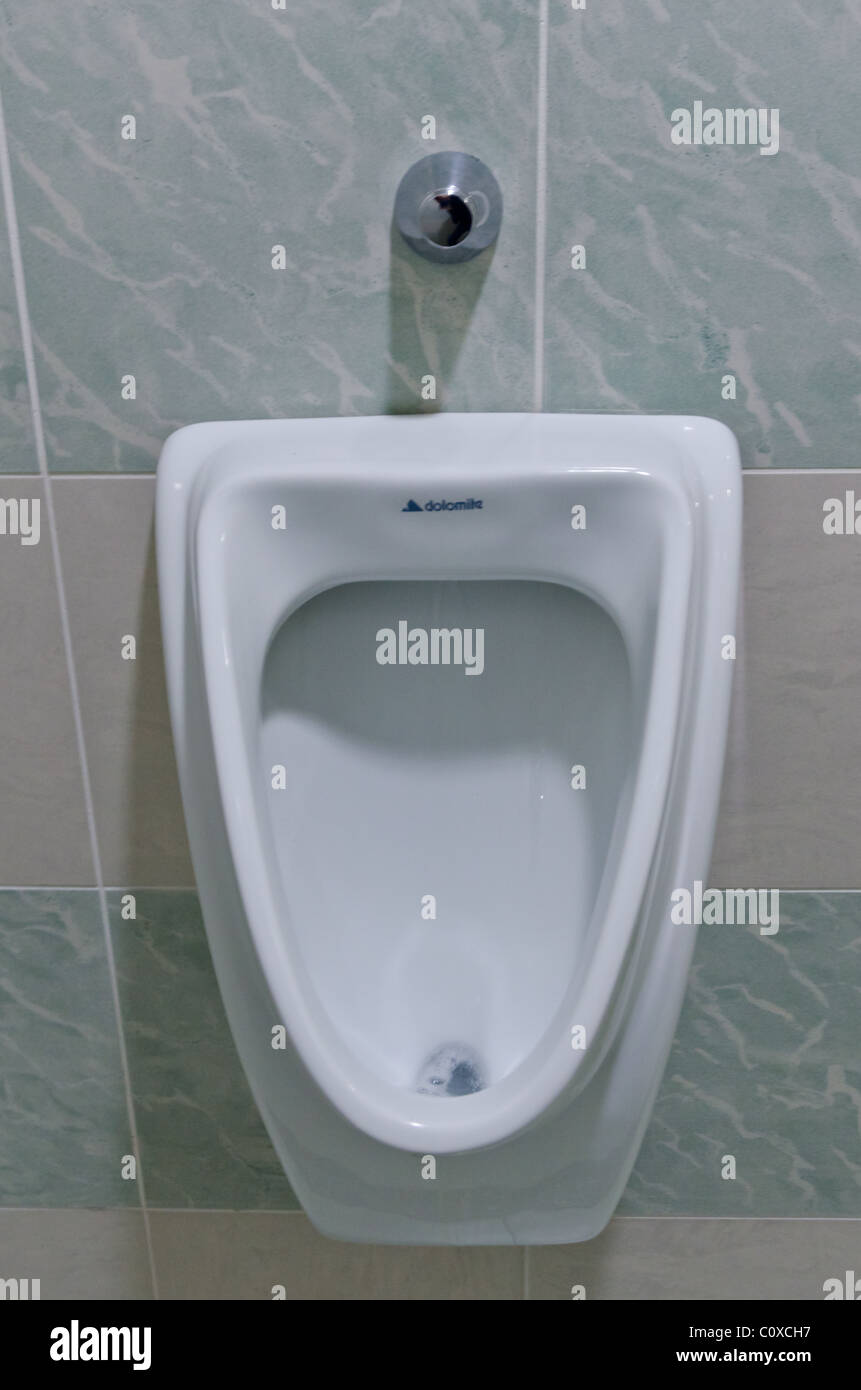White urinal hi-res stock photography and images - Alamy