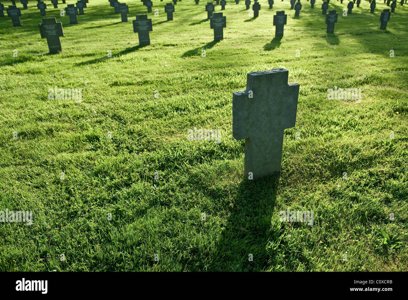 Cemetery with grass during sunset, long shadows Stock Photo - Alamy