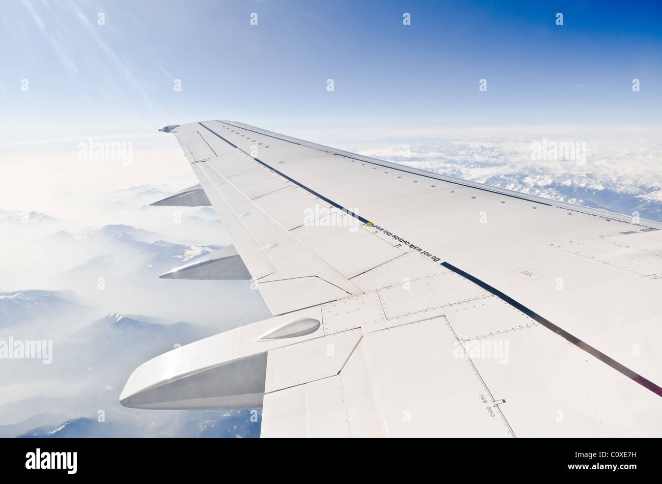 wing of plane infilght Stock Photo - Alamy