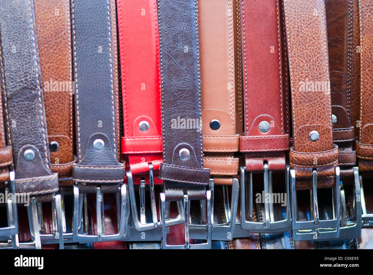 Belts Collection in a Tuscan Market, Italy Stock Photo - Alamy