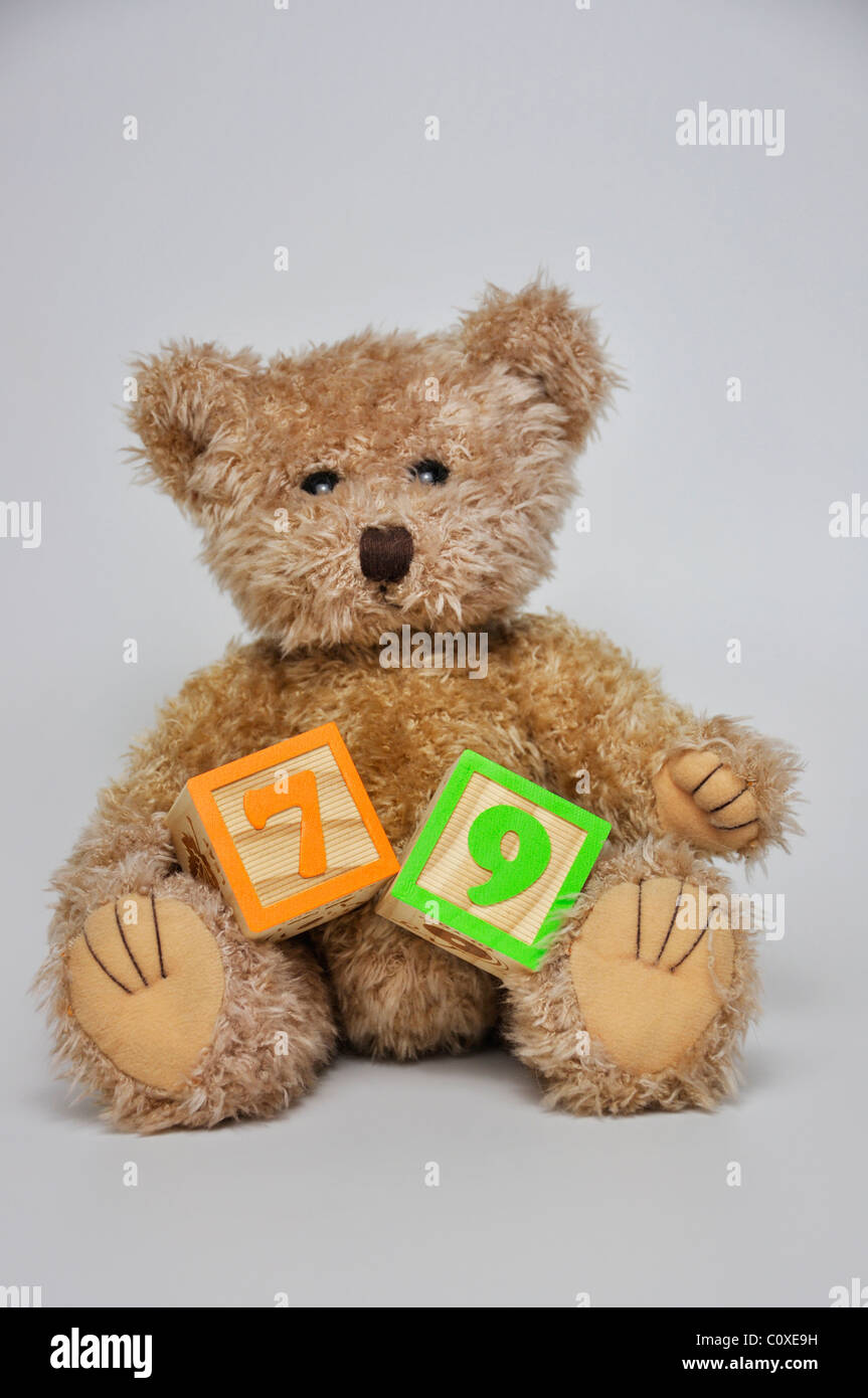 Teddy bear with cubes Stock Photo - Alamy