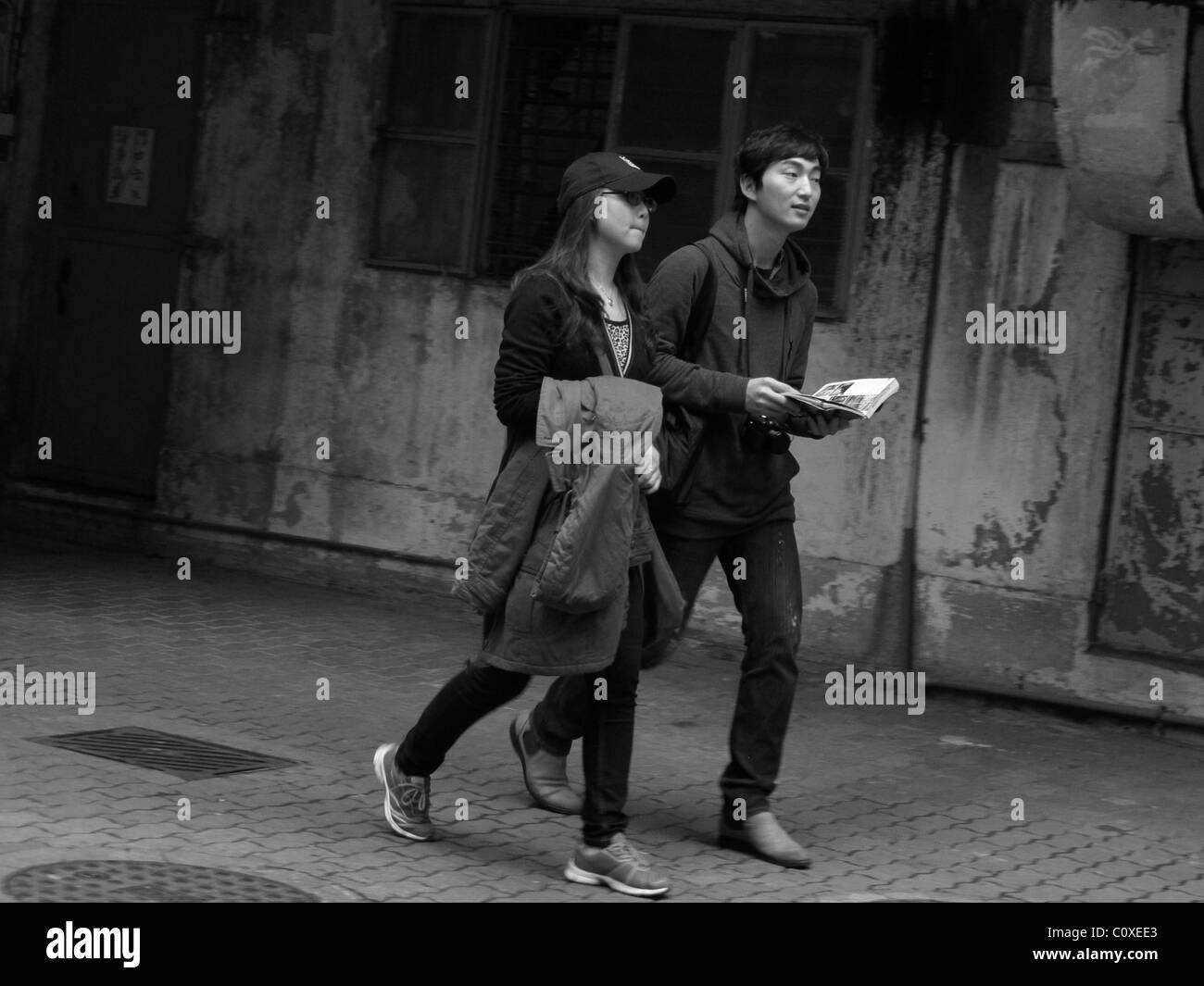Chinese girl walking Black and White Stock Photos & Images - Alamy