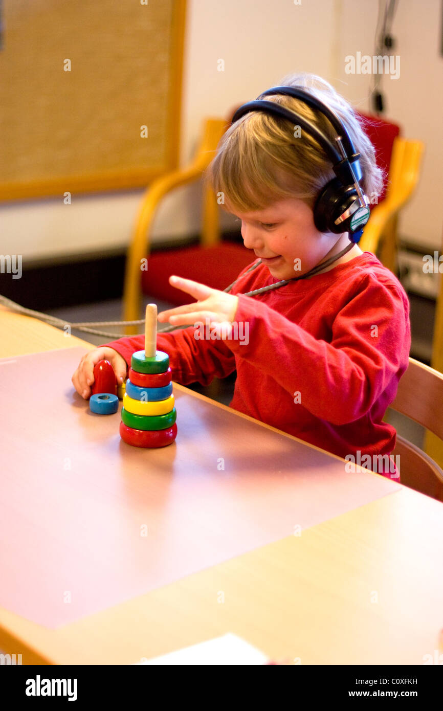 Child (4 years old) going through a hearing test (audiometry exam Stock ...