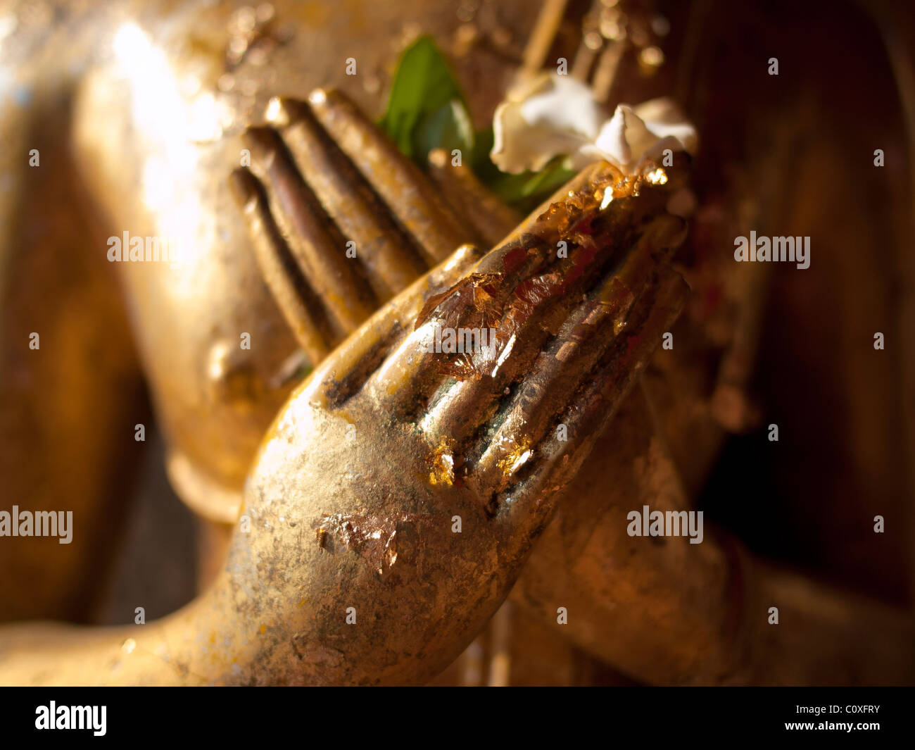 Buddha Image cross hands as a symbol of peaceful heart Stock Photo - Alamy