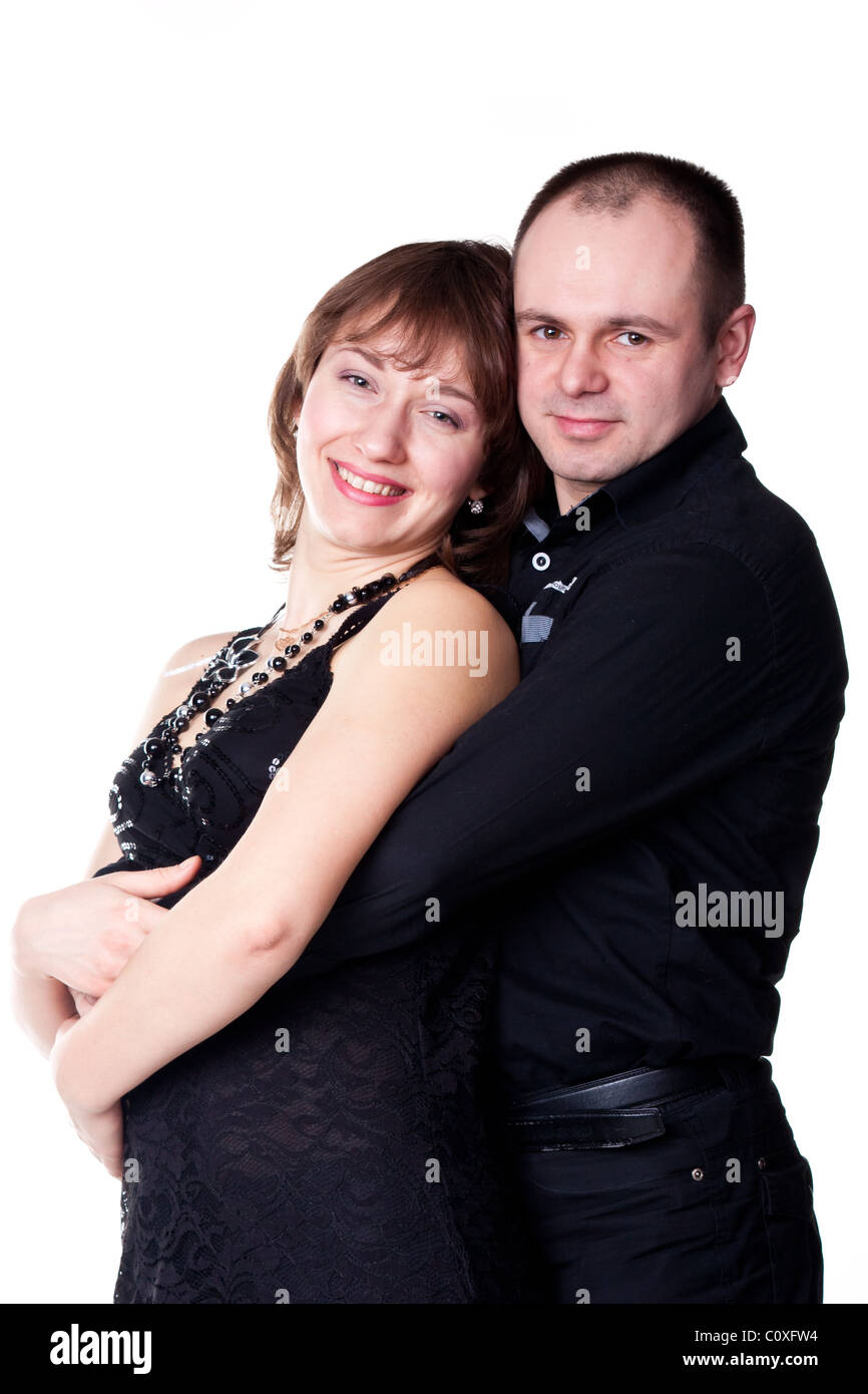 Portrait Of A Beautiful Young Happy Smiling Couple Isolated On White