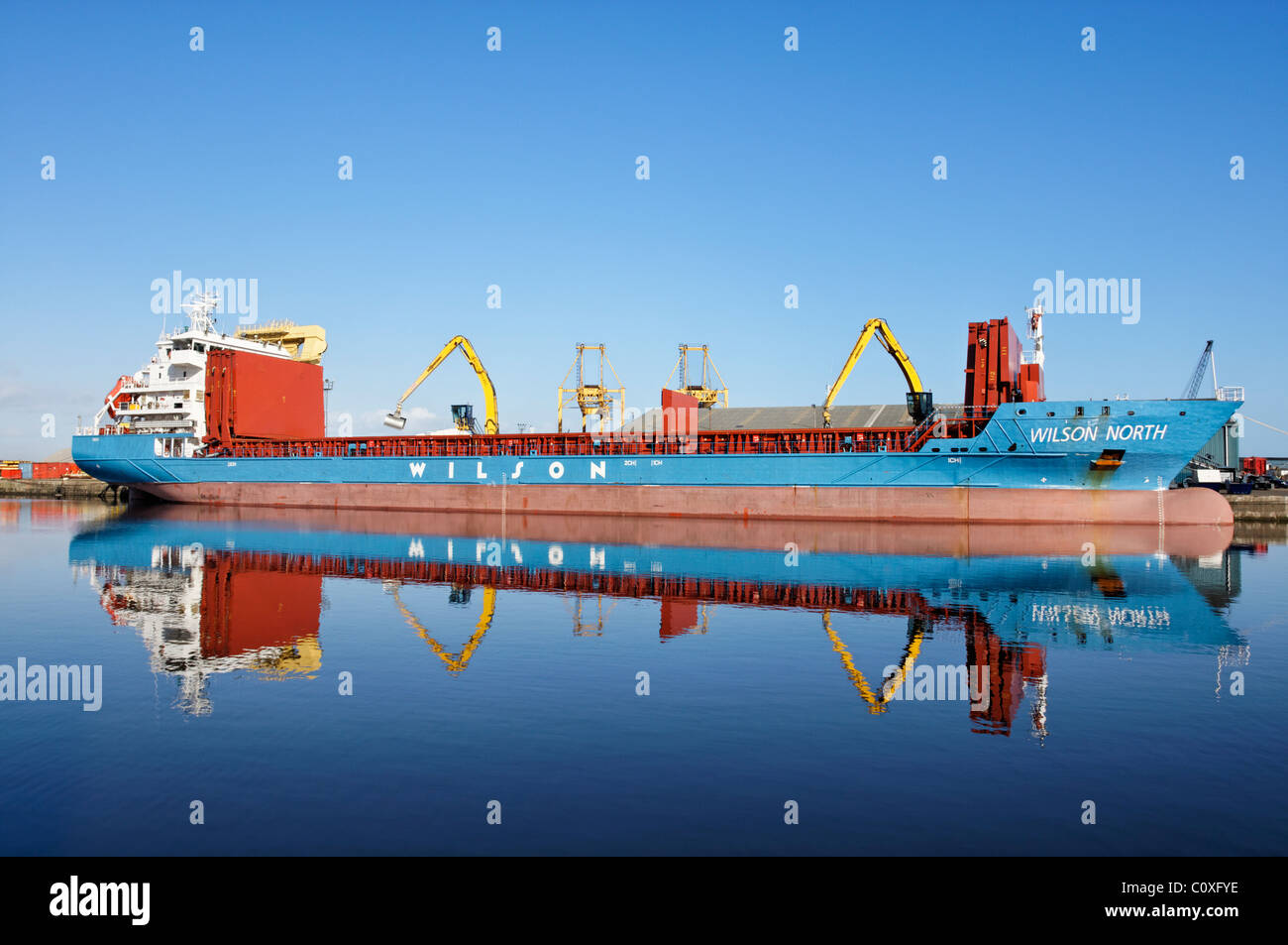 The Wilson North cargo ship being unloaded at Leith Docks, Edinburgh ...