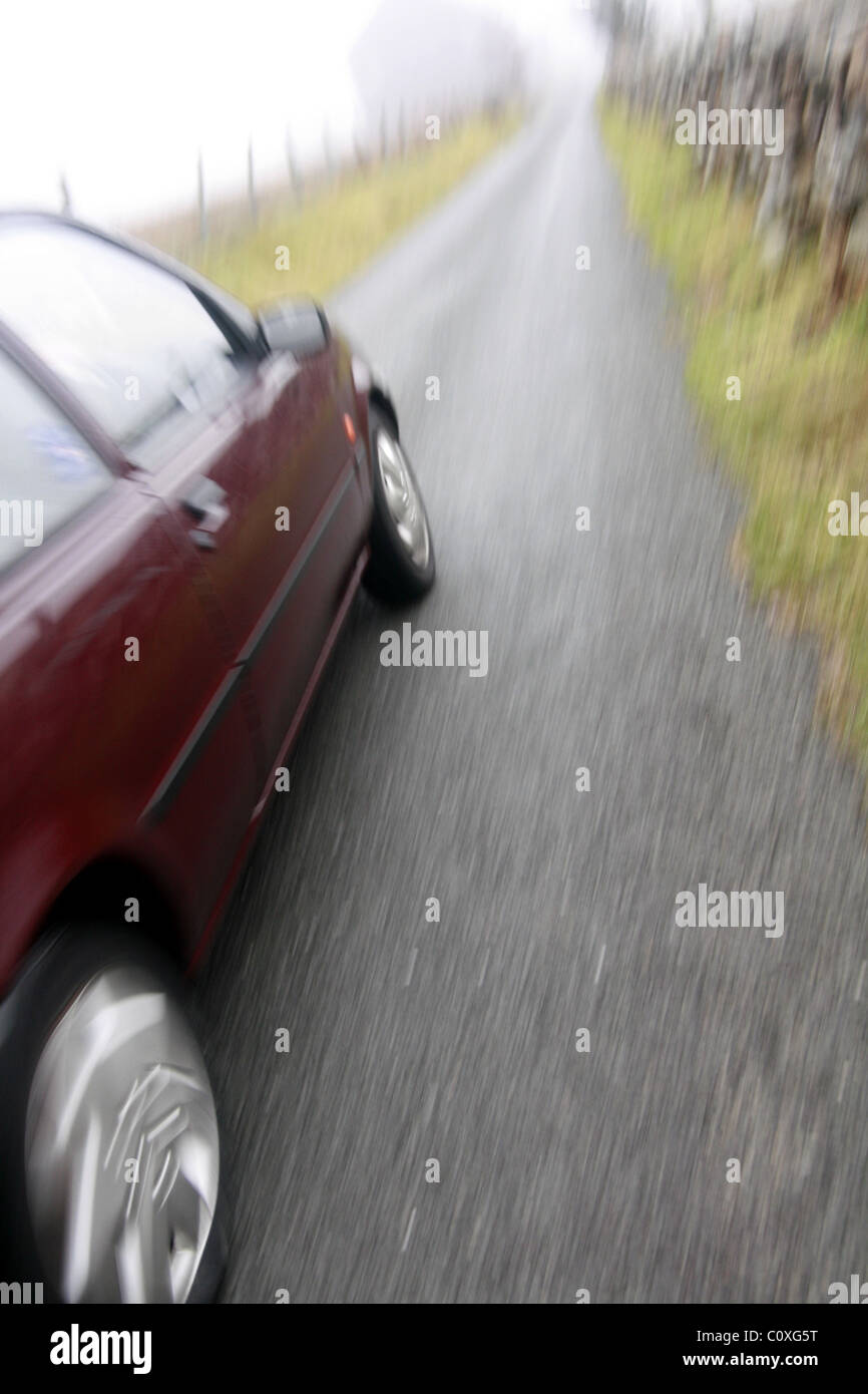 fast car on country lane with motion blur Stock Photo - Alamy
